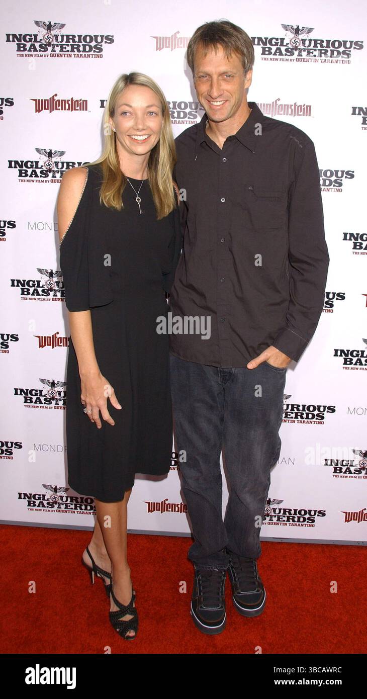 Tony Hawk and his wife at the "Inglourious Basterds" premiere held at ...