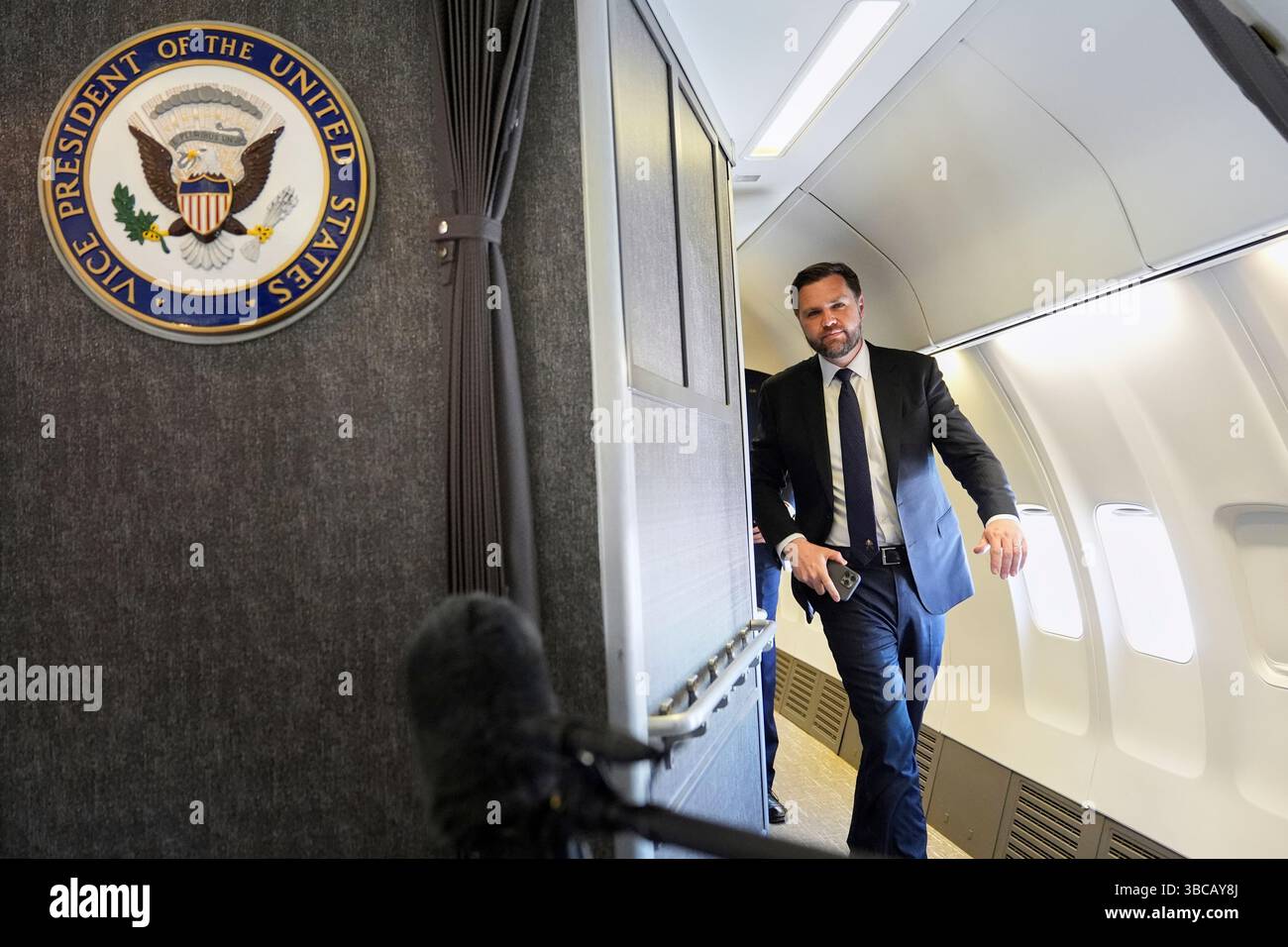 Vice President JD Vance arrives to talk to reporters on board Air Force ...