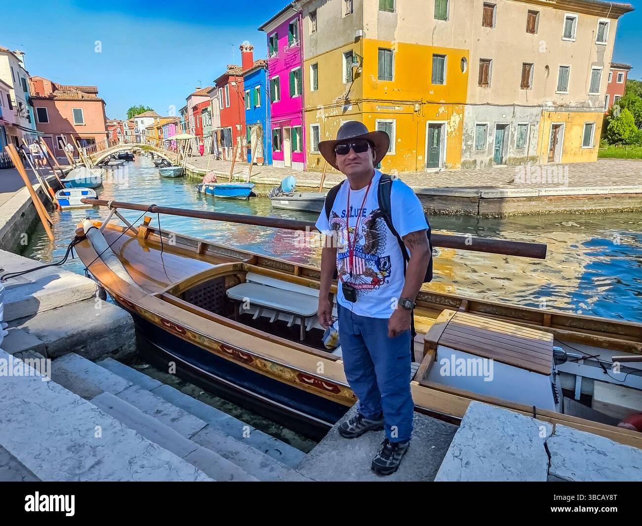 The colorful island of Burano, Italy in the Venetian Lagoon is ...