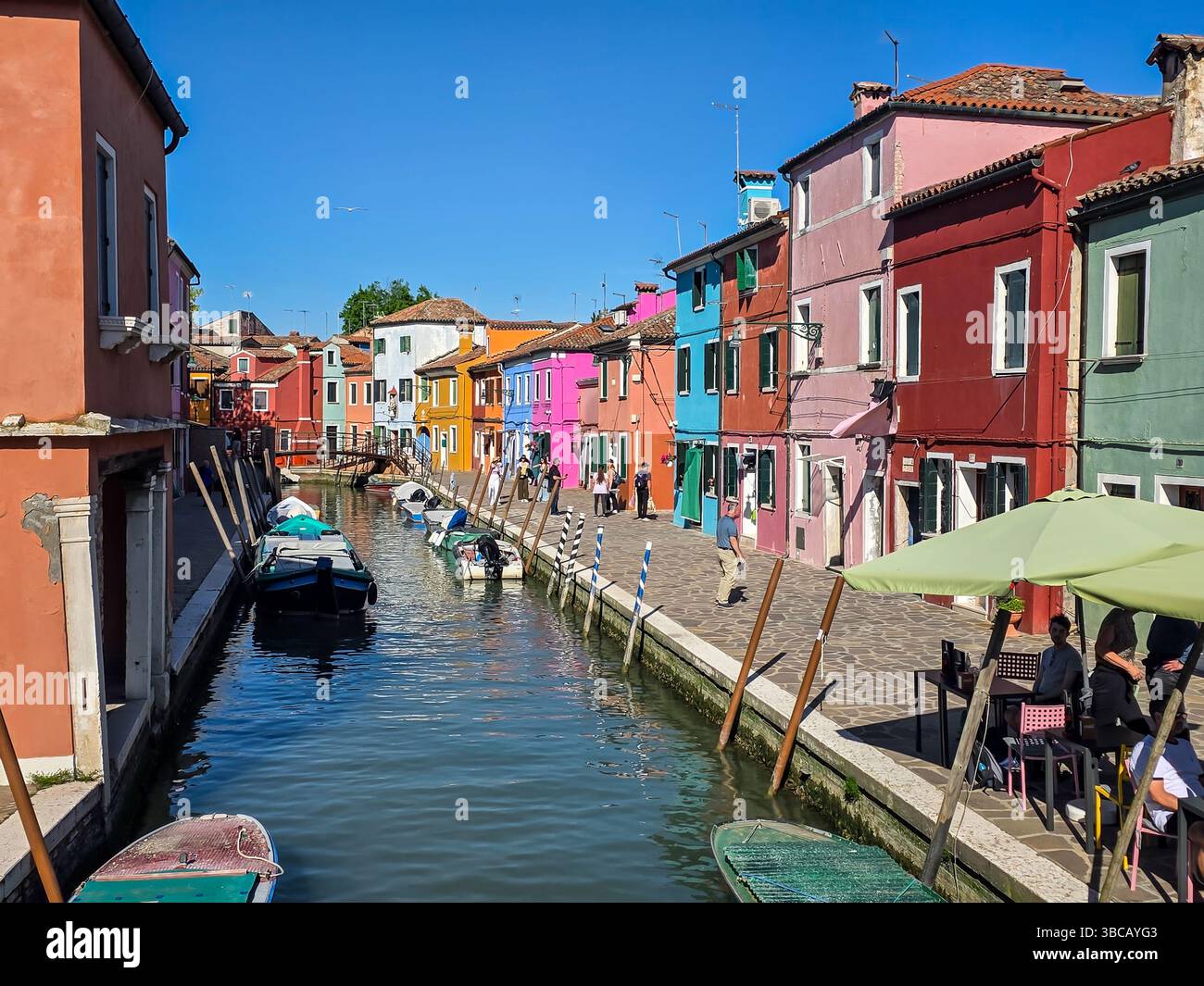 The colorful island of Burano, Italy in the Venetian Lagoon is ...
