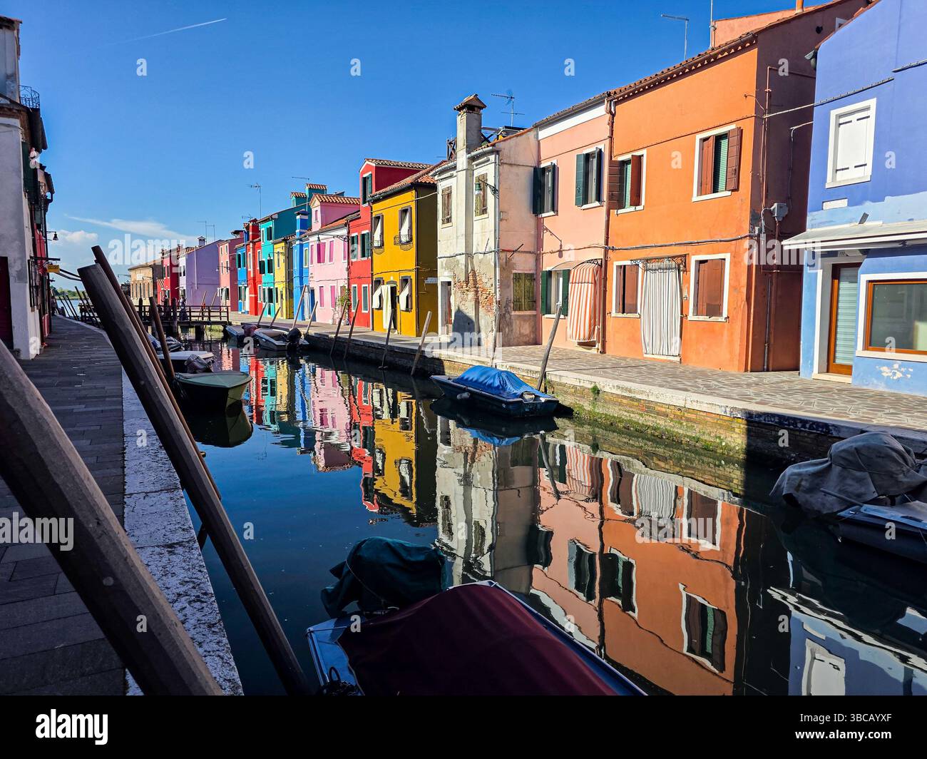 The colorful island of Burano, Italy in the Venetian Lagoon is ...