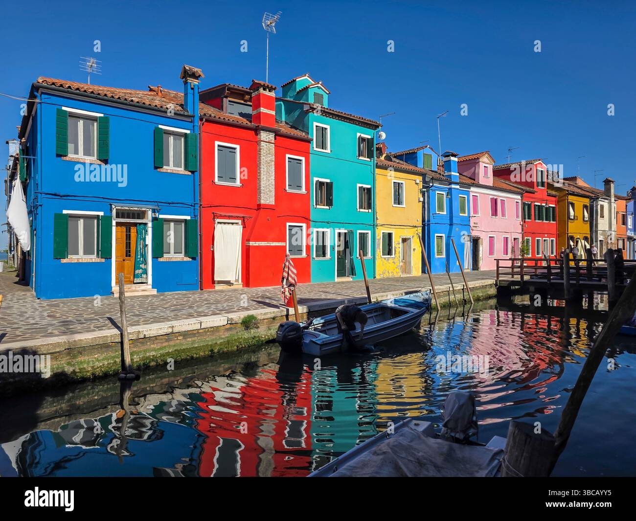 The colorful island of Burano, Italy in the Venetian Lagoon is ...