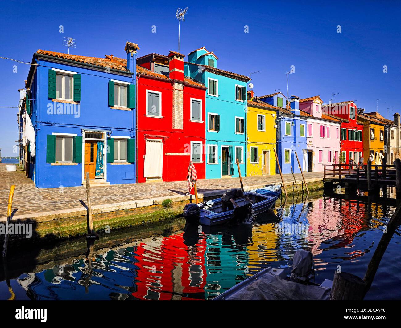 The colorful island of Burano, Italy in the Venetian Lagoon is ...