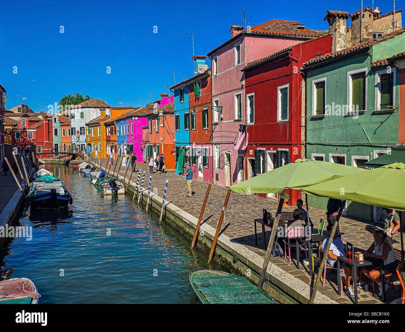 The colorful island of Burano, Italy in the Venetian Lagoon is ...