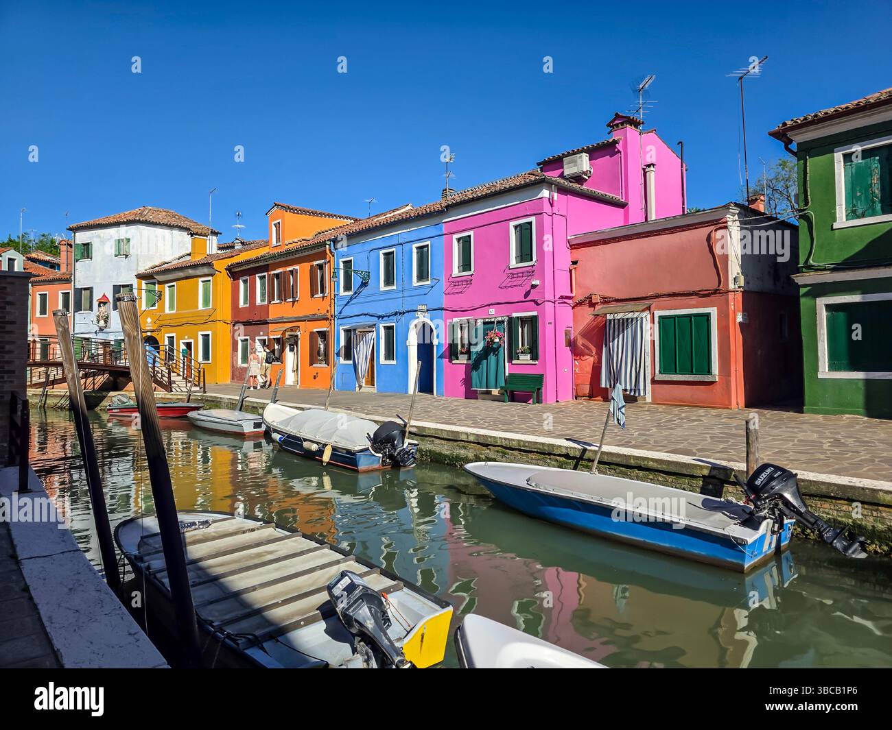 The colorful island of Burano, Italy in the Venetian Lagoon is ...