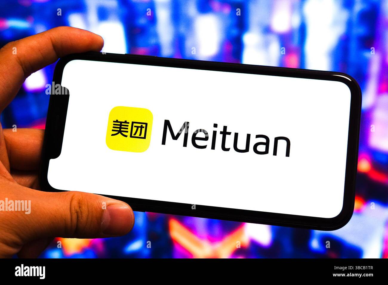 China. 19th May, 2025. In this photo illustration, a logo of Meituan is ...