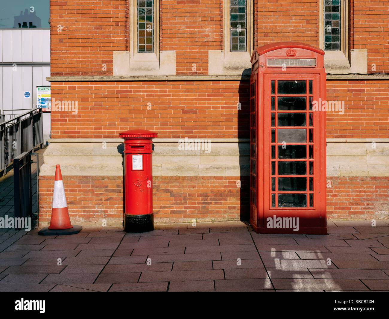 Three red British everyday icons of the high Street in Stratford Upon ...