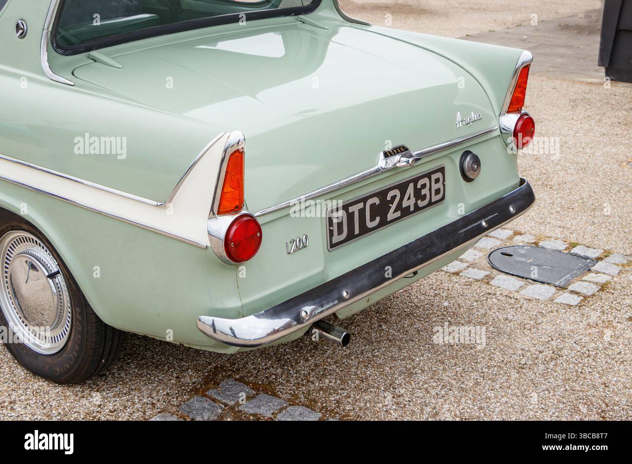 rear lights and wing of 1960s green ford anglia at vintage classic car ...
