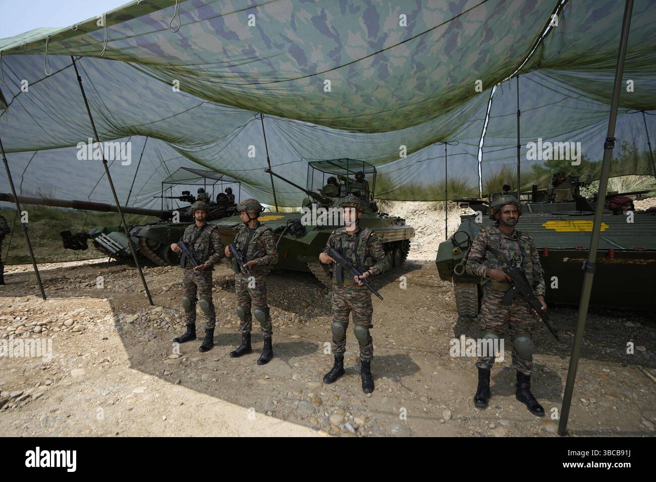Indian army soldiers stand guard at one of the forward bases used in ...