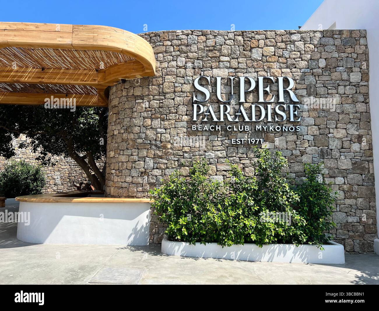 The iconic stone entrance of Super Paradise Beach Club in Mykonos ...