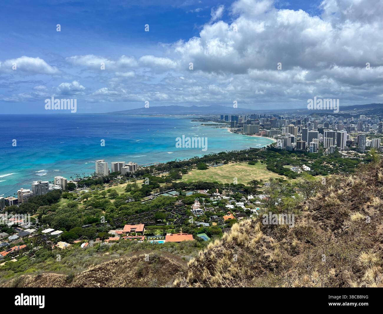 A sweeping view from Diamond Head Crater reveals Honolulu’s skyline and ...