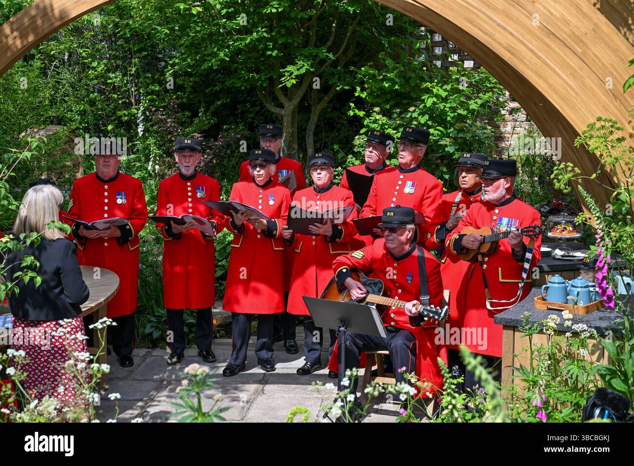London, UK. 19th May, 2025. Chelsea Pensioners sing a celebtration song ...
