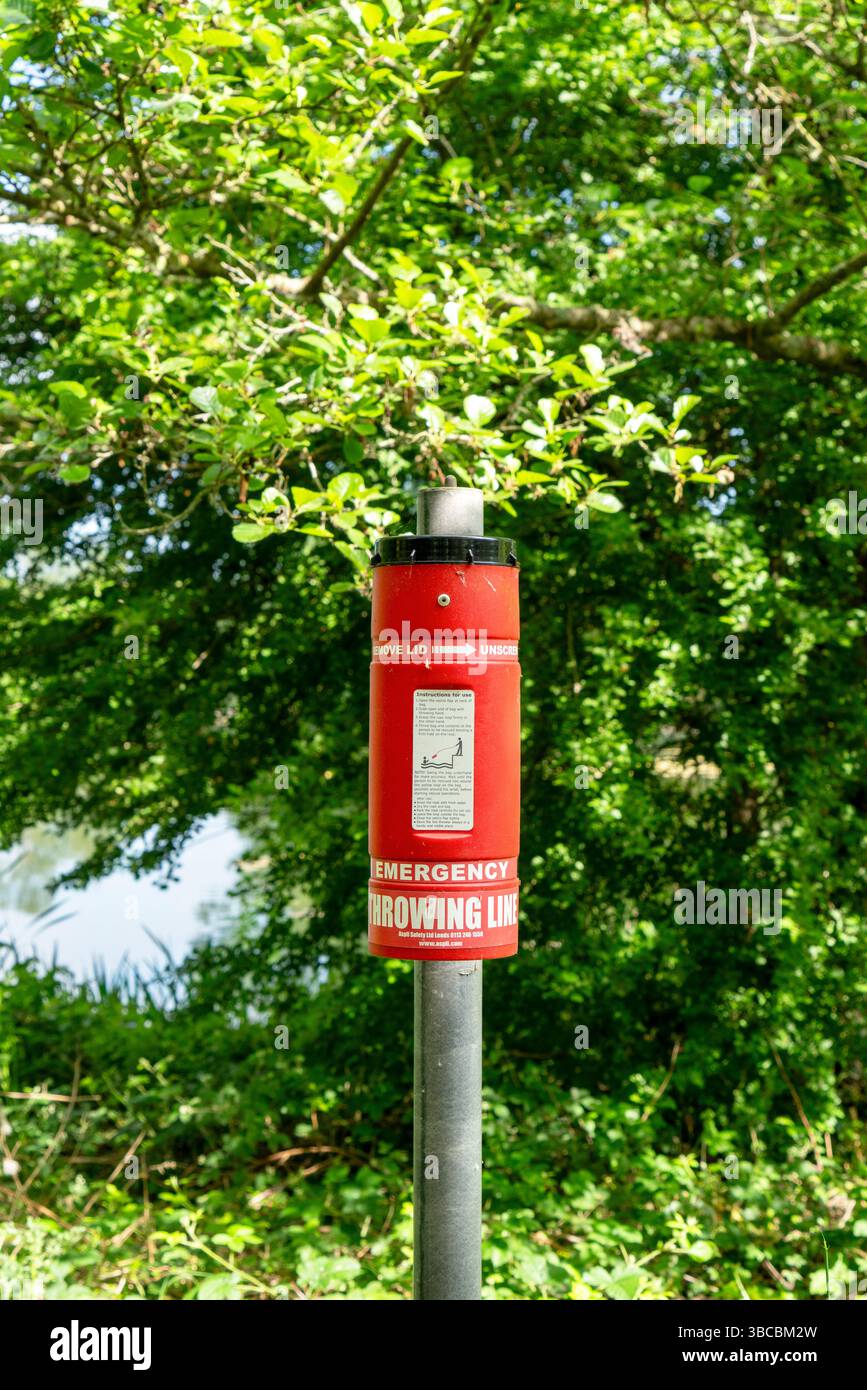 Red emergency life saving throwing line container Stock Photo - Alamy