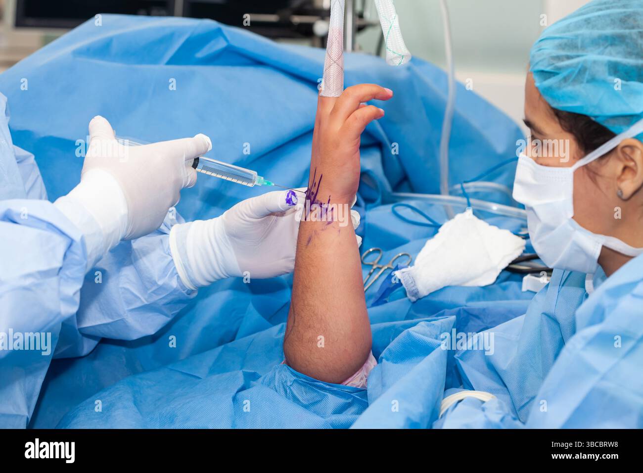 Female doctor performing a surgery. Orthopedic surgeon. Surgery and ...