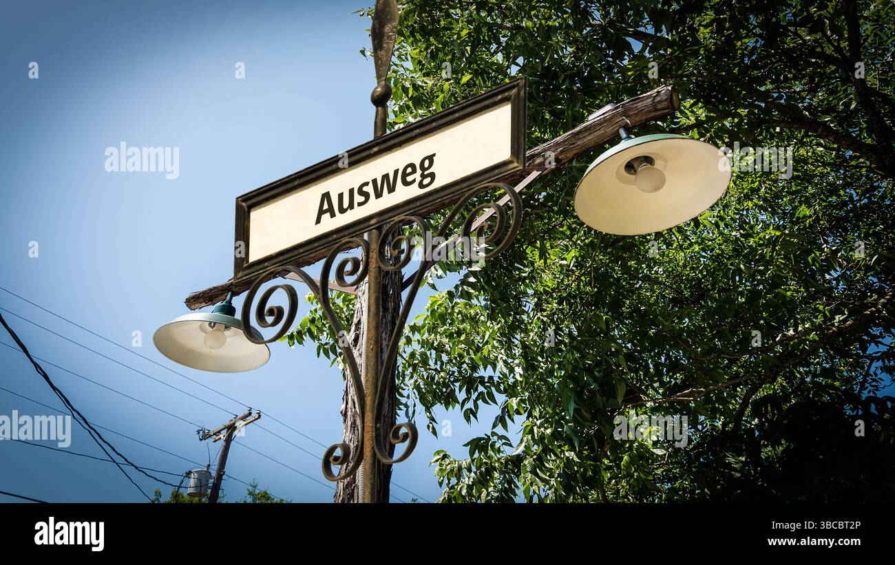 Image shows a signpost and a sign in the direction of exit in German ...