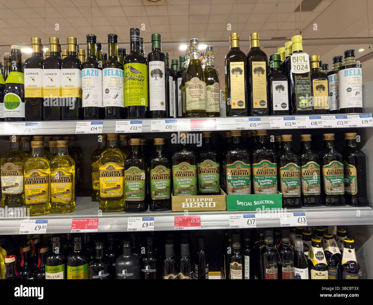 Variety of olive oils from different countries, Booths grocery store ...