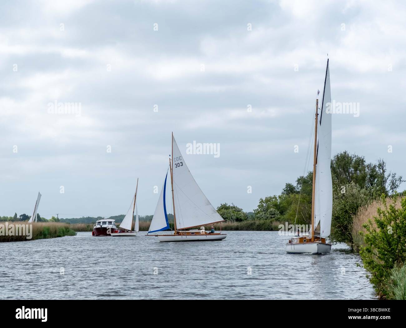 Upton, Norfolk, UK – May 18 2025. Traditional sailing boats tacking ...