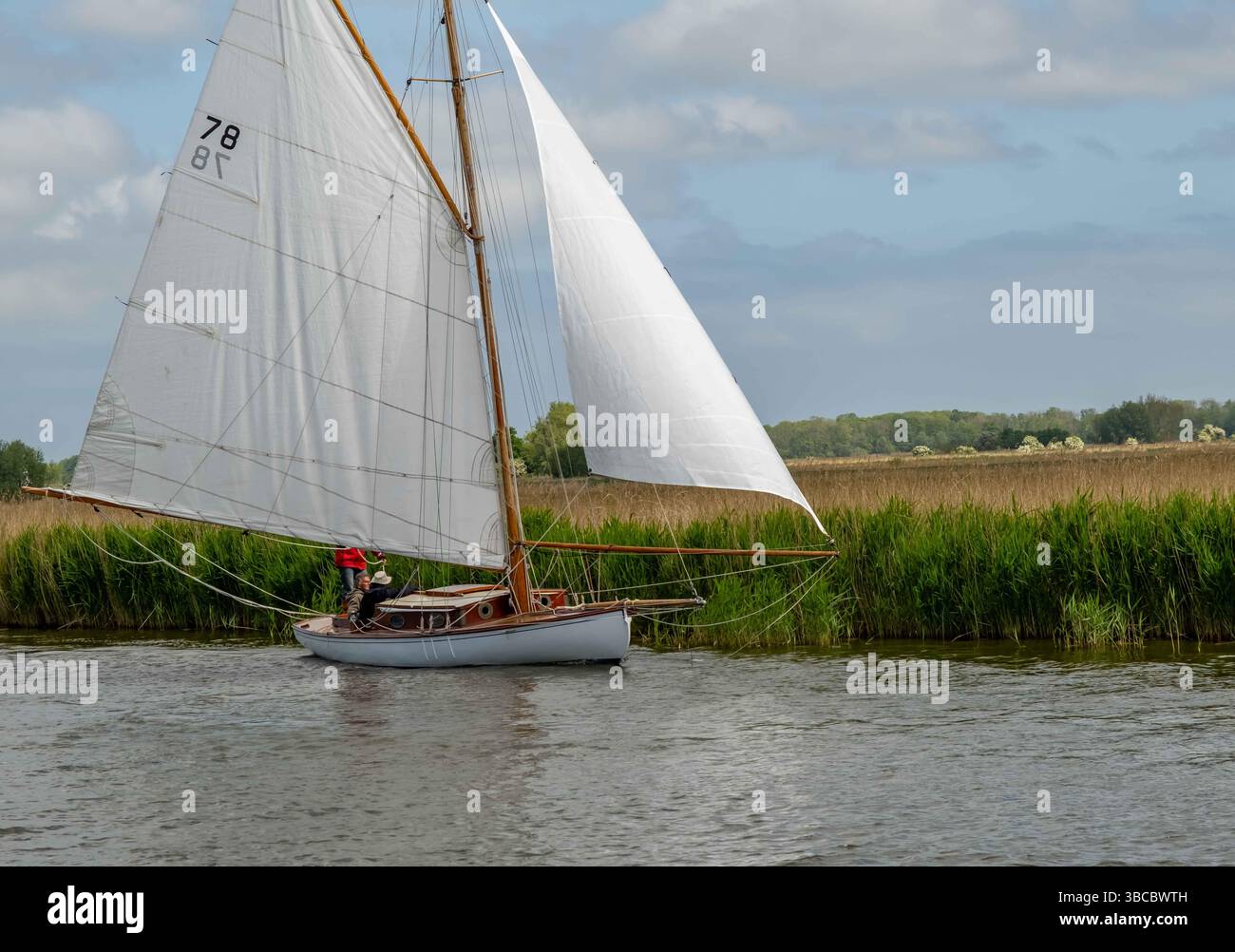 Upton, Norfolk, UK – May 18 2025. River cruiser racing down the River ...
