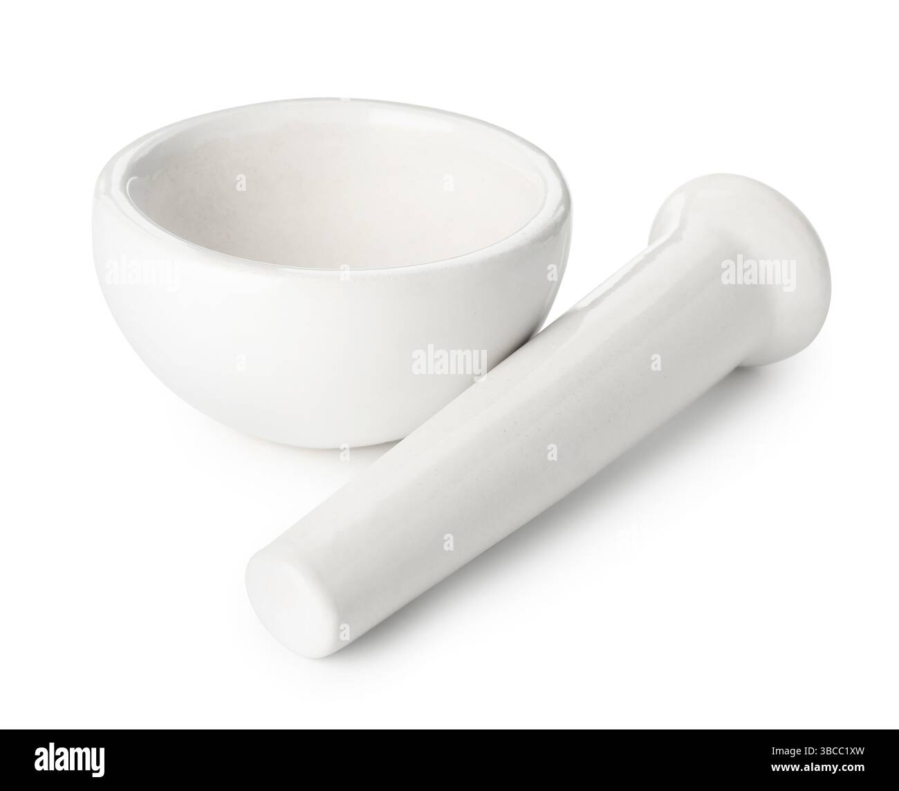 Ceramic mortar with pestle isolated on white Stock Photo - Alamy