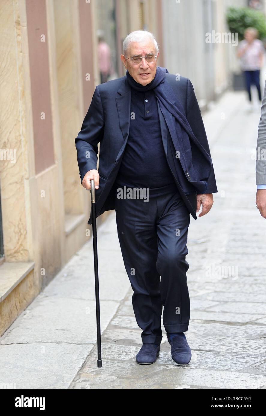 Milan, Marcello Dell'Utri walks through the streets of the center Stock ...