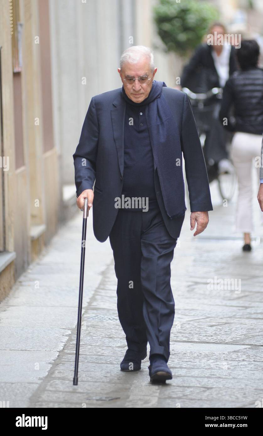 Milan, Marcello Dell'Utri walks through the streets of the center Stock ...