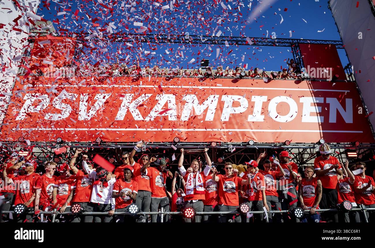 EINDHOVEN - Players and staff of PSV are honored on the Stadhuisplein ...