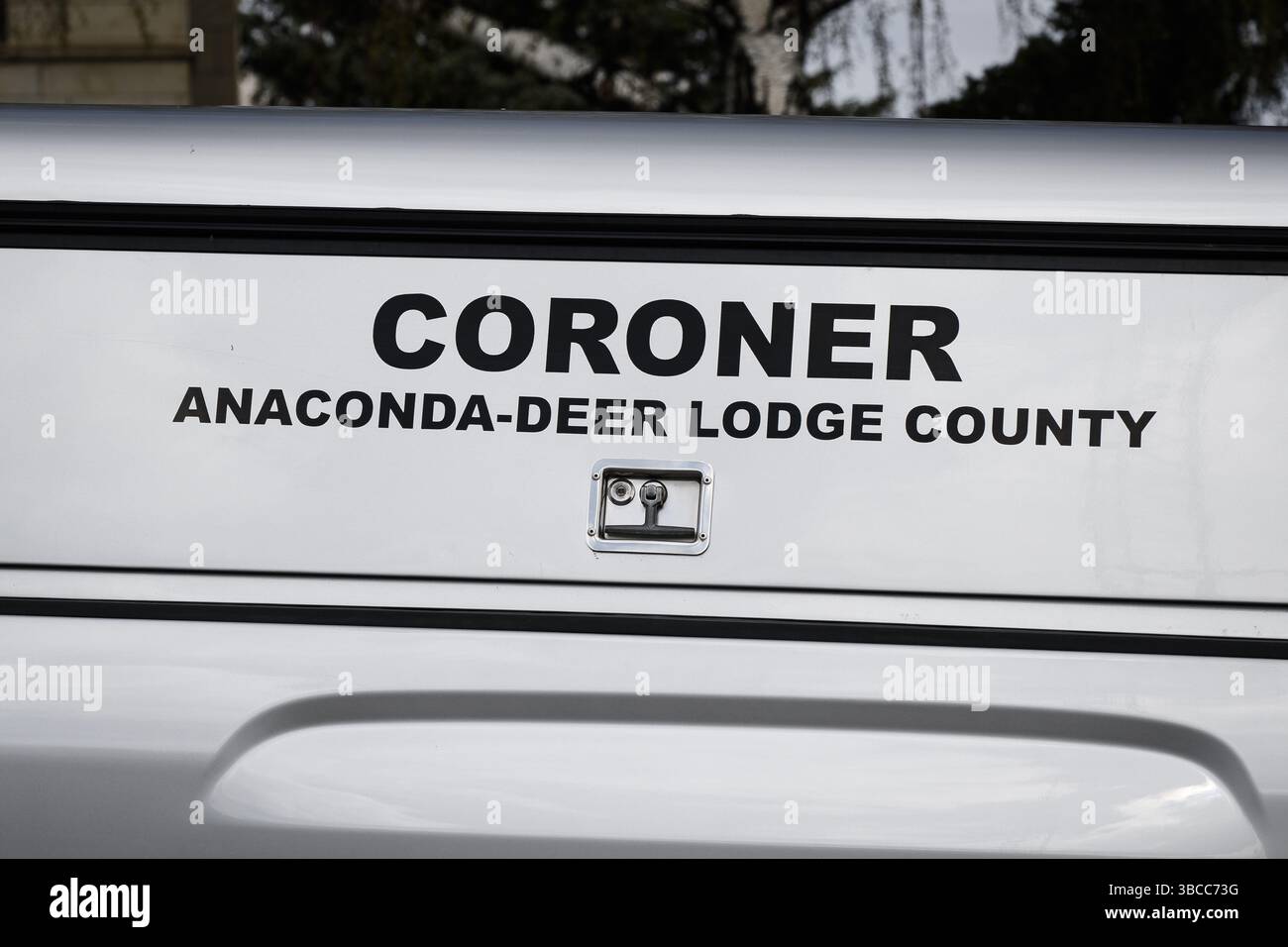 Anaconda, MT, USA - May 6, 2025; Name in closeup on coroner Anaconda ...