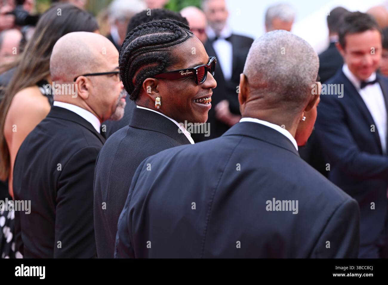 Denzel Washington (right) and ASAP Rocky (centre) attend the premiere ...