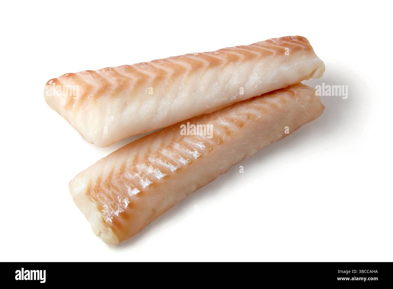 two frozen cod fillets isolated on white background Stock Photo - Alamy