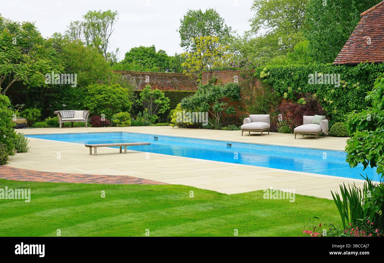 Swimming pool at the gardens of the Manor House, Ayot St Lawrence Stock ...