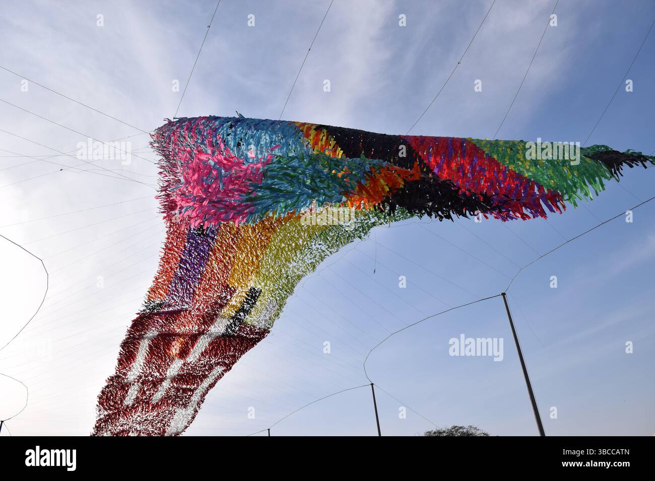 Colors in the Sky: A vibrant canopy of floating ribbons dances with the ...