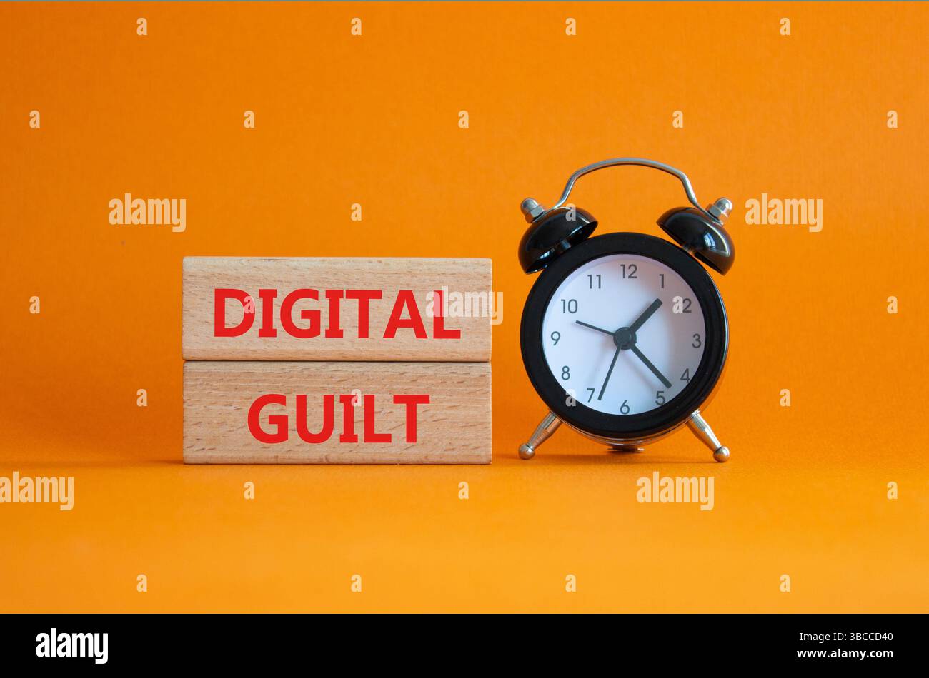 Digital Guilt symbol. Concept words Digital Guilt on wooden blocks ...