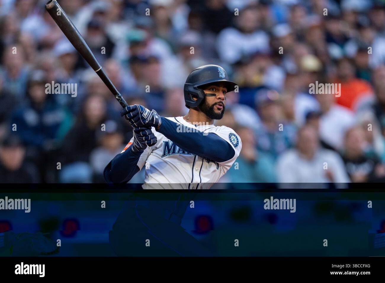 Seattle Mariners' Leody Taveras takes a swing during an at-bat in a ...