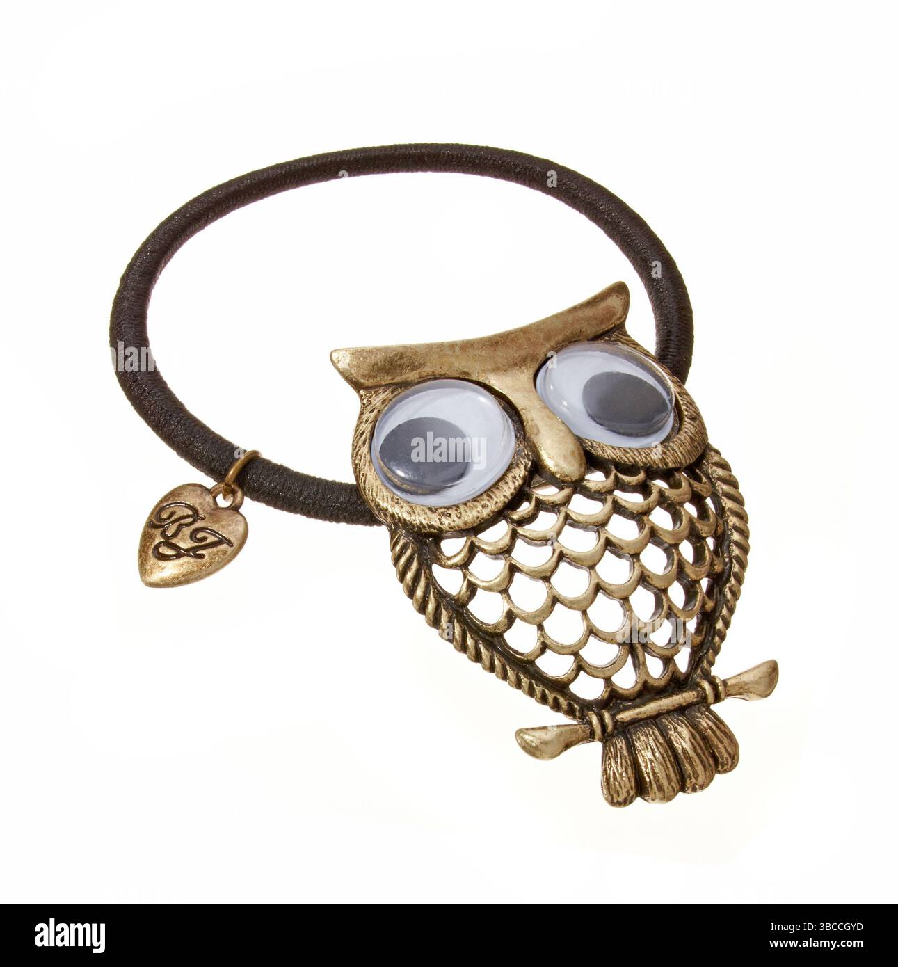 betsey johnson owl hair tie photographed on a white background Stock ...