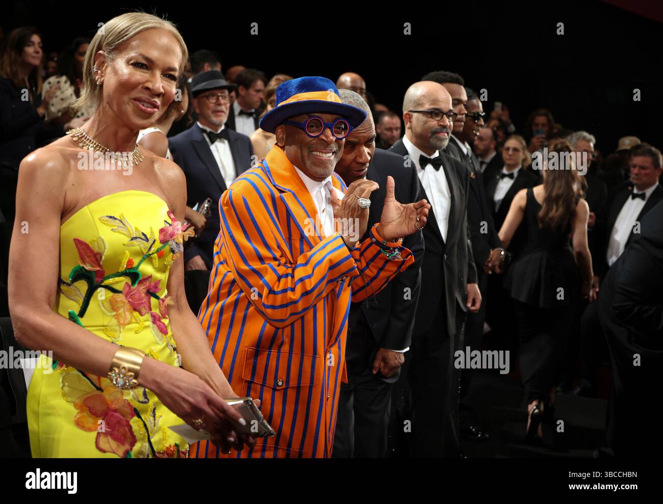 Actor Denzel Washington, center partially hidden, US producer Tonya ...