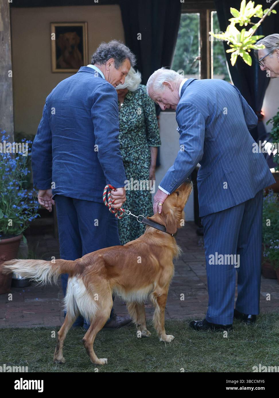 King Charles III, Patron of The Royal Horticultural Society, pets Ned ...