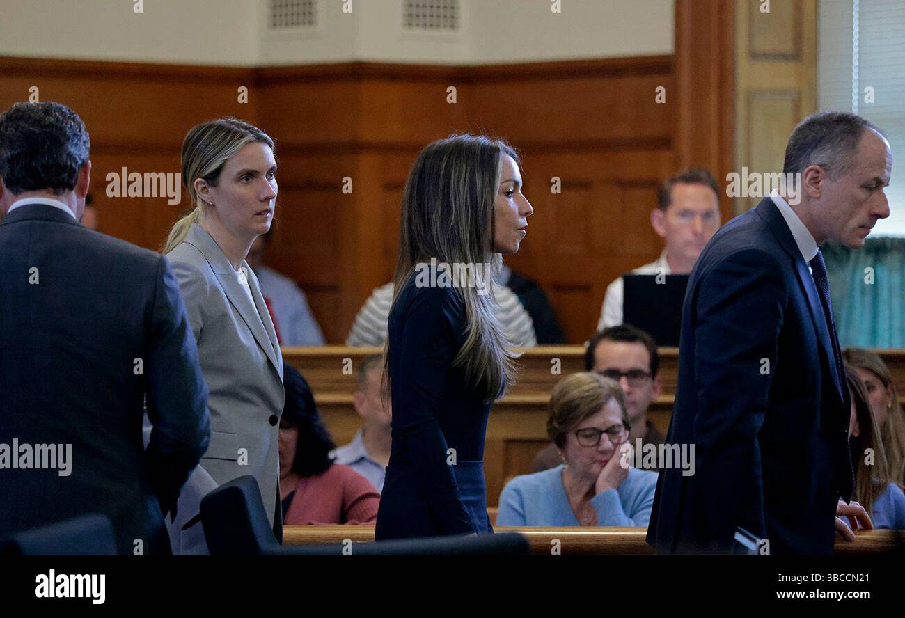 Karen Read heads to the bench for a sidebar with her defense team ...