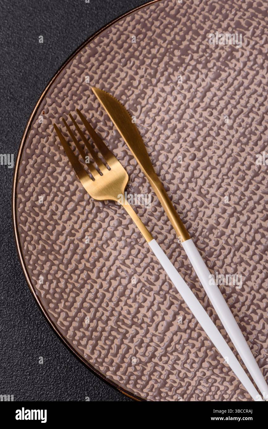Empty plate with utensils as a conceptual background for lunch ...