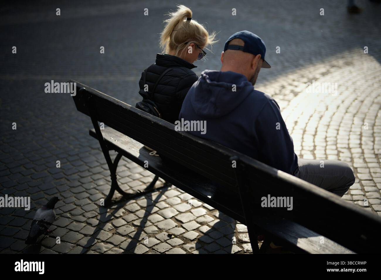 Warsaw, Poland. 19th May, 2025. A woman and a man are seen sitting on a ...