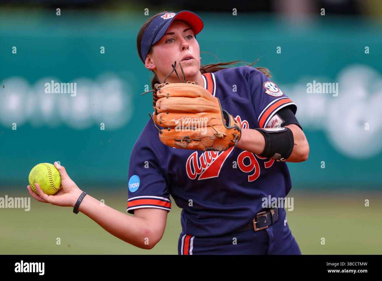 Auburn infielder Rose Roach (99) warms up before an NCAA regional ...
