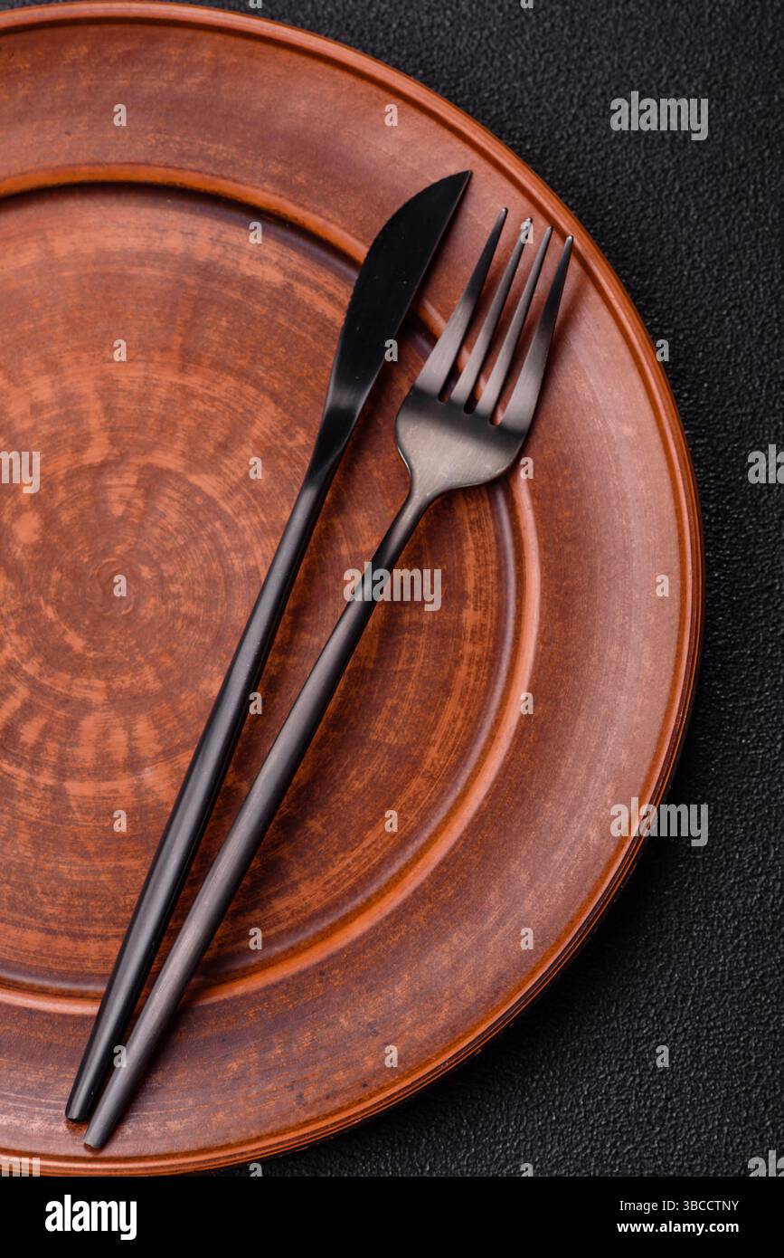Empty plate with utensils as a conceptual background for lunch ...