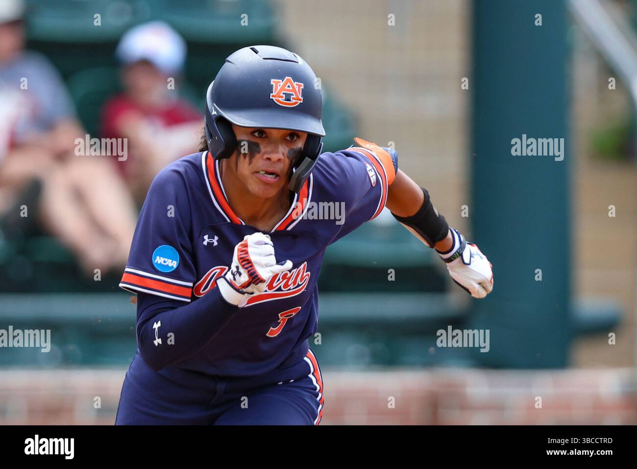 Auburn utility Icess Tresvik (3) runs to first base during an NCAA ...