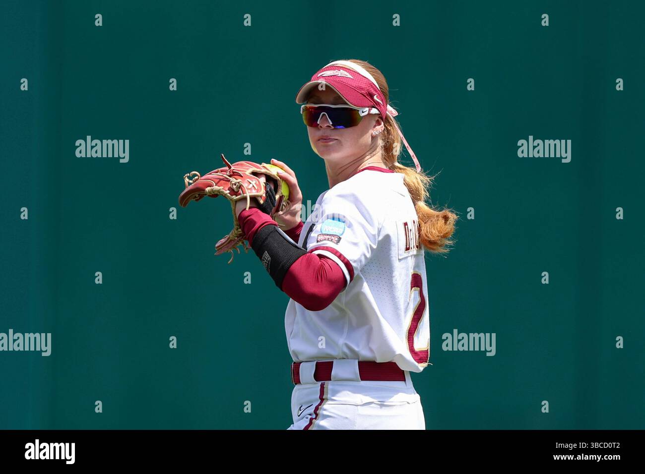 Florida State outfielder Addie DeLong (2) warms up before an NCAA ...