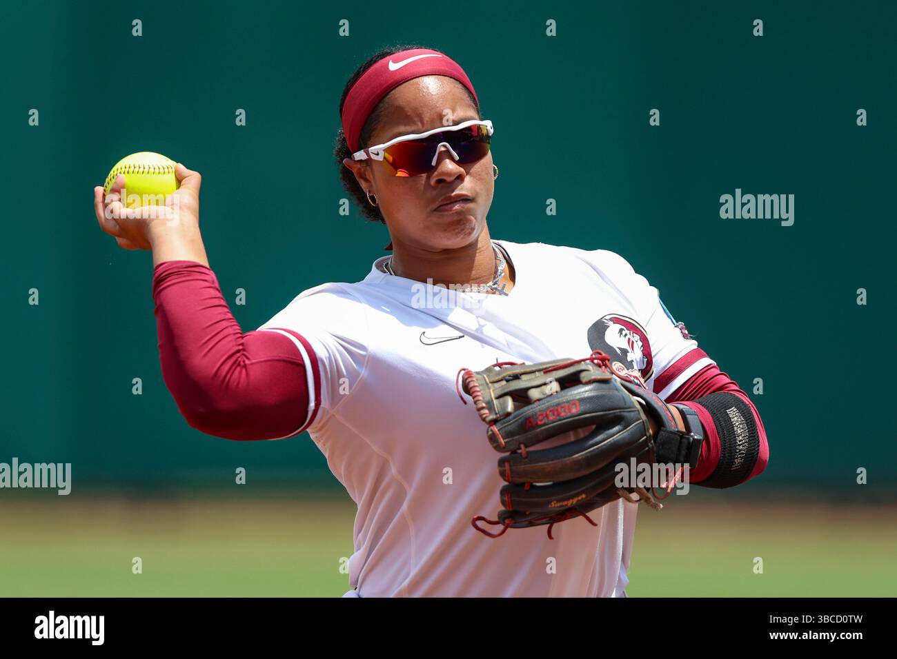 Florida State infielder Jaysoni Beachum (42) warms up before an NCAA ...