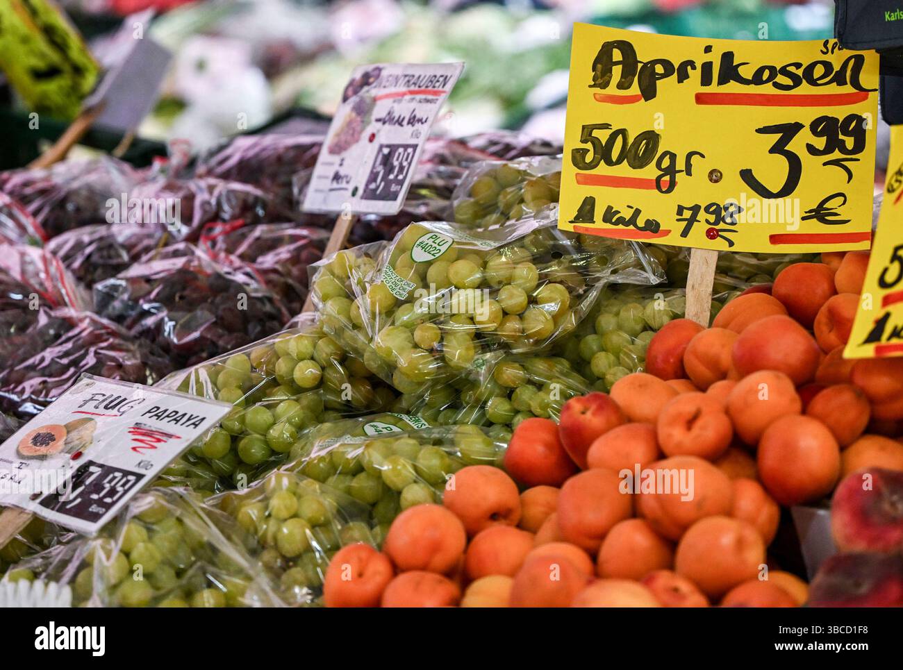 Berlin, Germany. 19th May, 2025. Apricots are sold at a greengrocer for ...