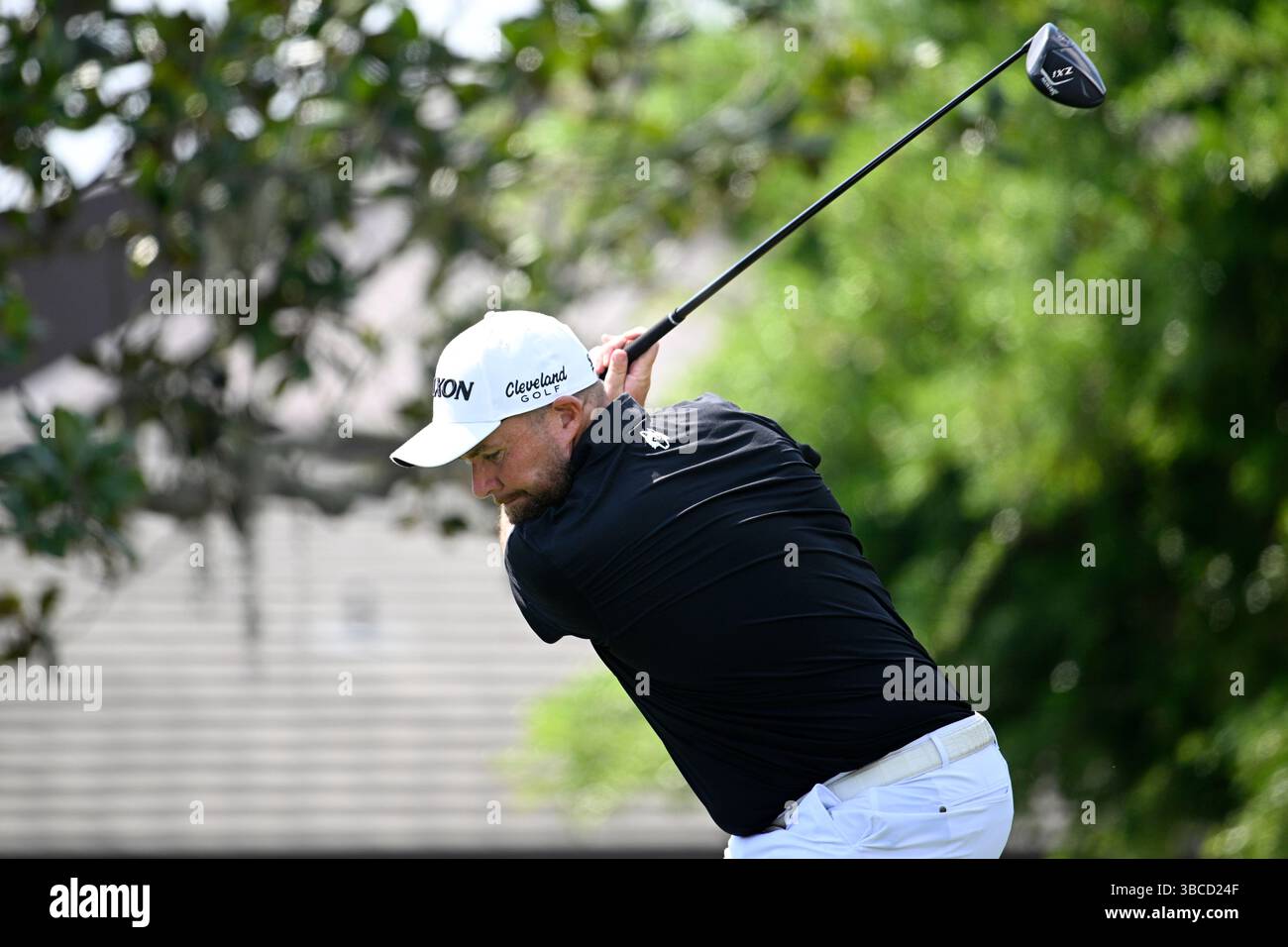 Shane Lowry, of Ireland, tees off on the first hole during the final ...