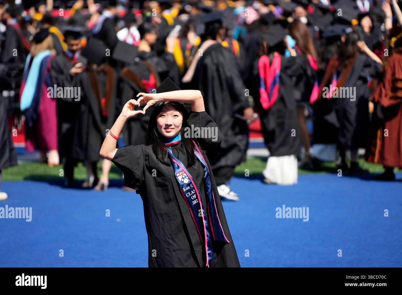 A student from the class of 2025 celebrates her graduation during the ...