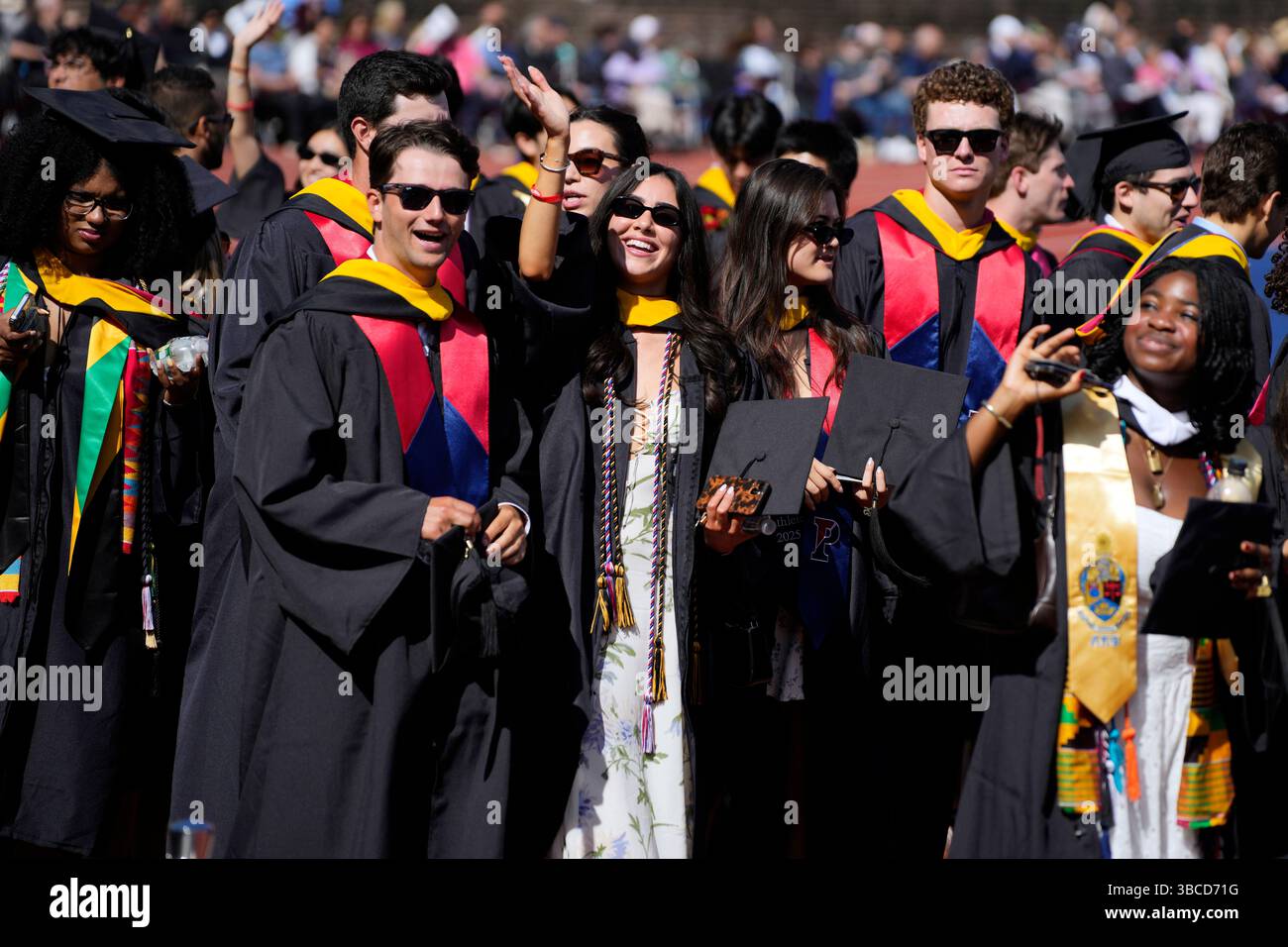 Students from the class of 2025 celebrate their graduation during the ...