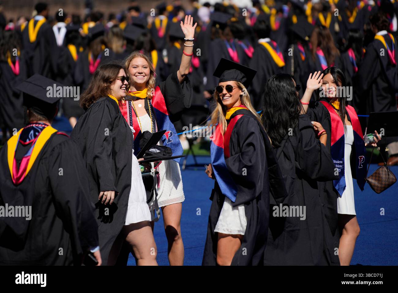 Students from the class of 2025 celebrate their graduation during the ...