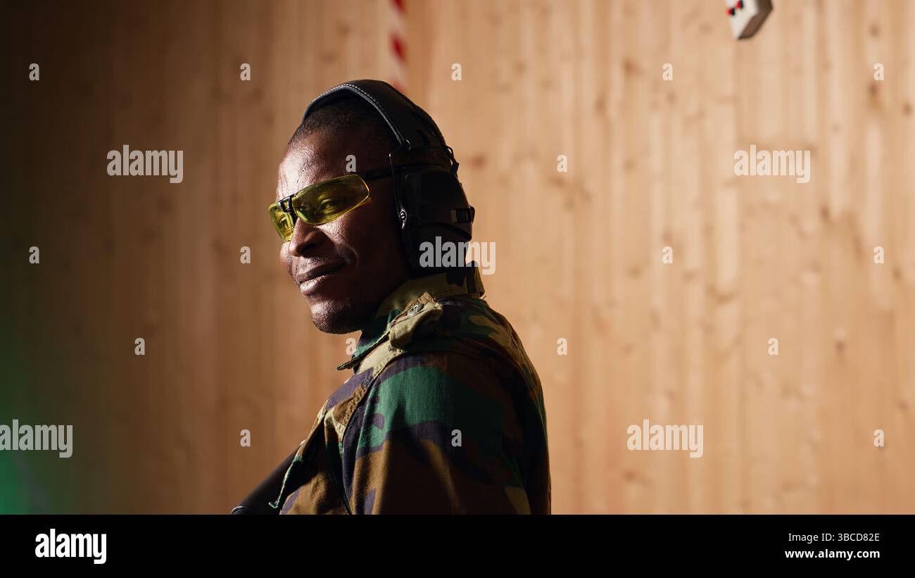 Portrait of happy military personnel using tactical operations ...